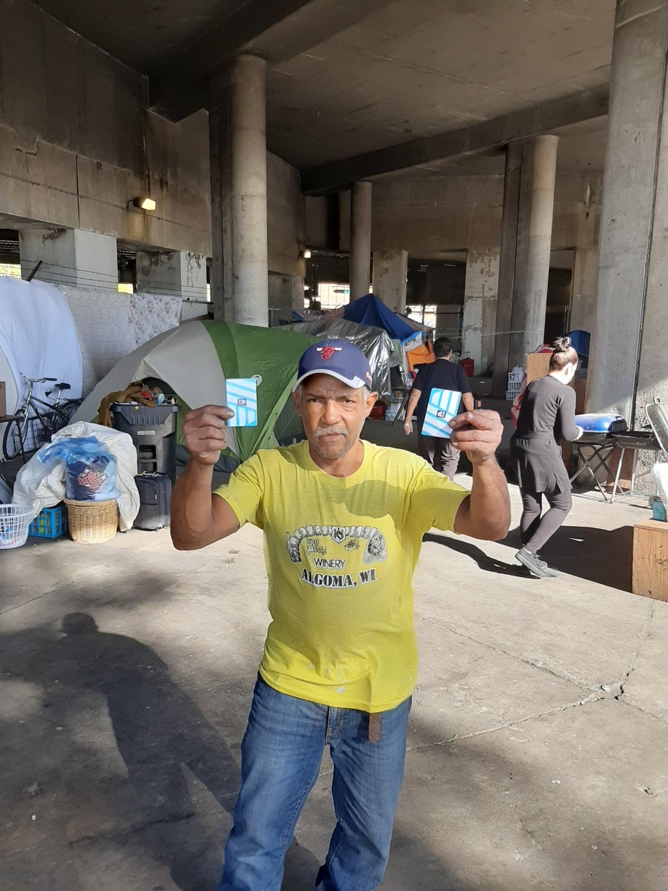 Donations distributed to homeless encampment after fire - Chicago ...